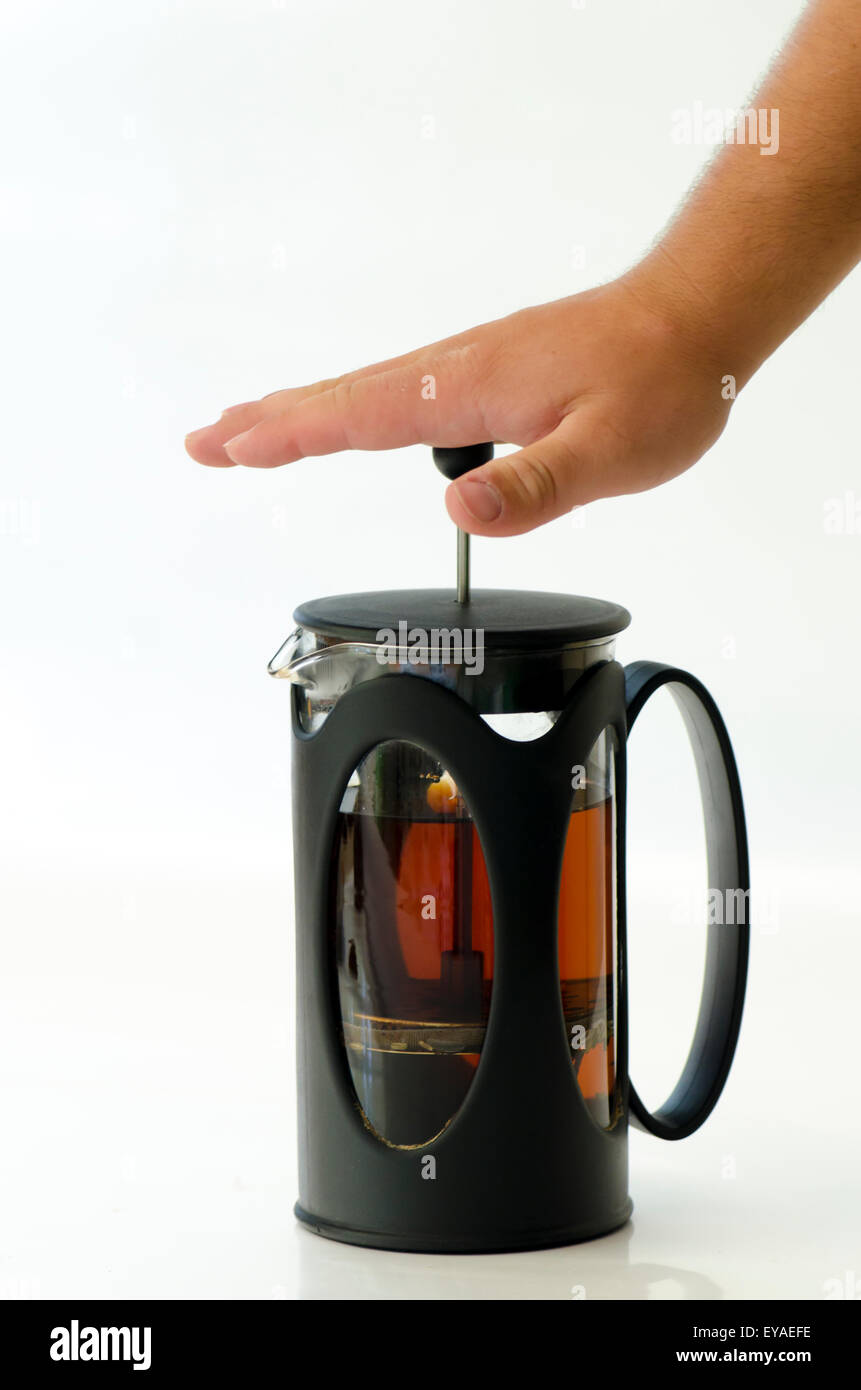 Hand pull french press for making tea isolated on white background ...