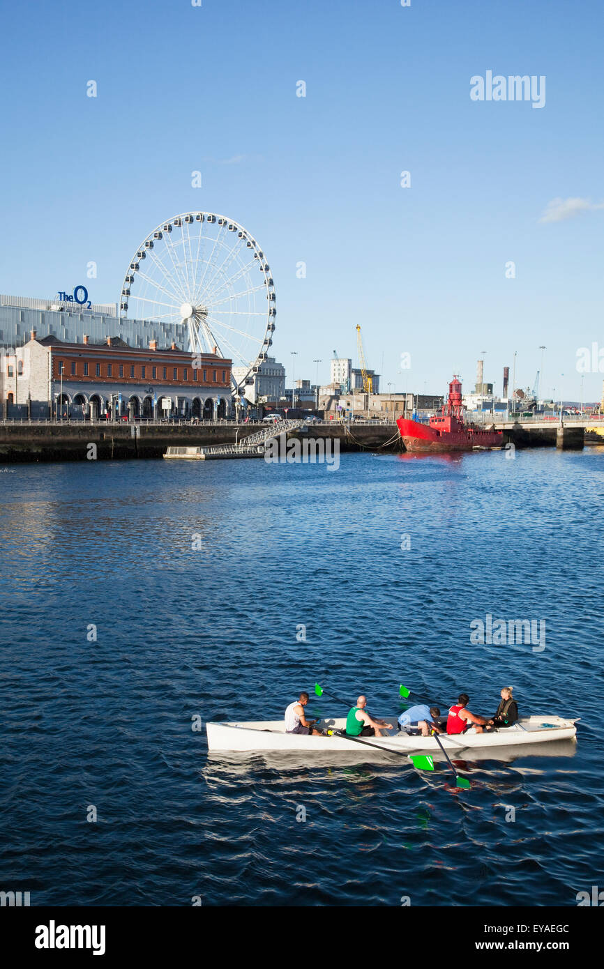 Rowing A Boat In The River Liffey And The O2 Arena At The Waterfront ...