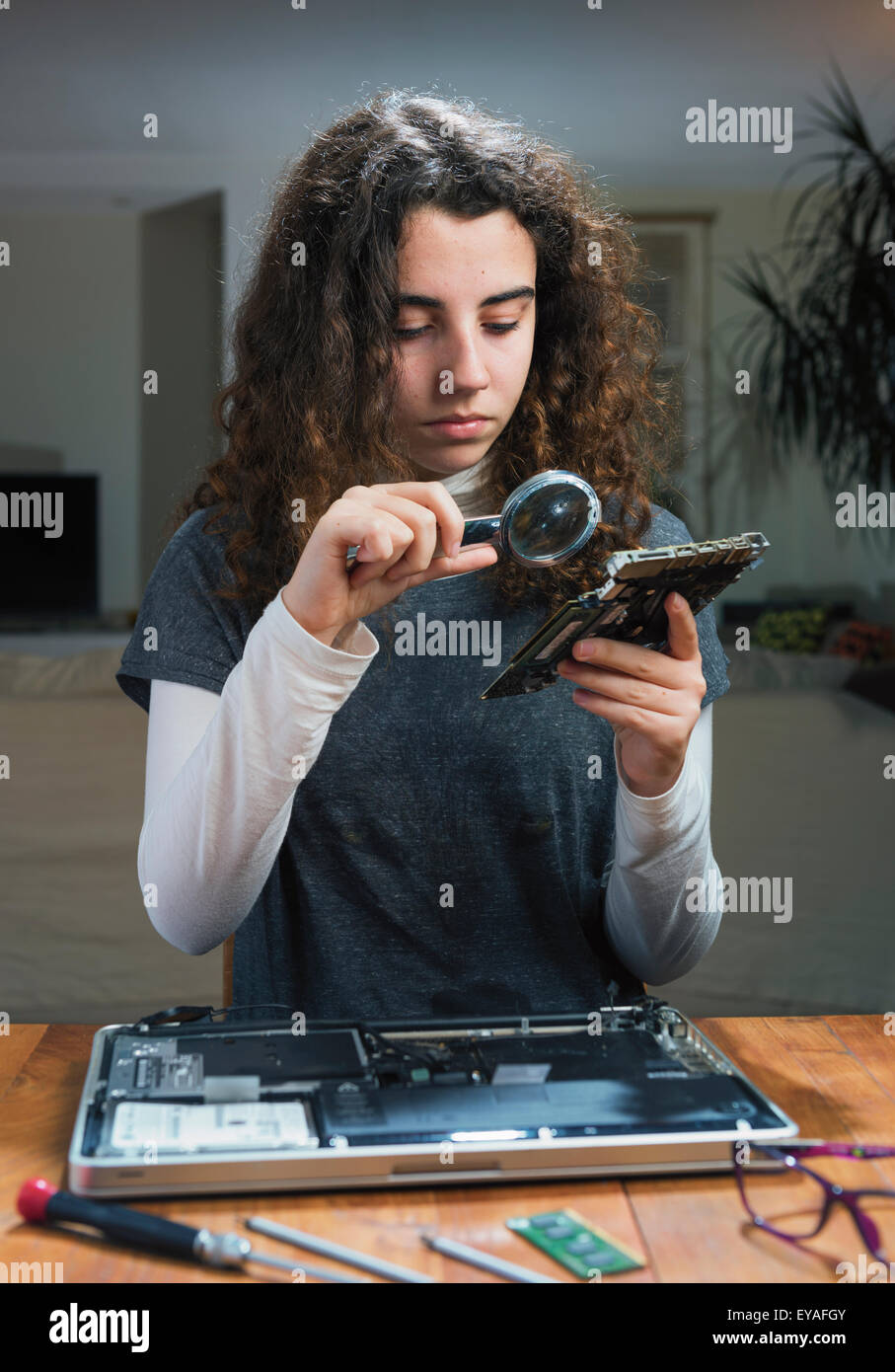 Teenager interested in science Stock Photo - Alamy
