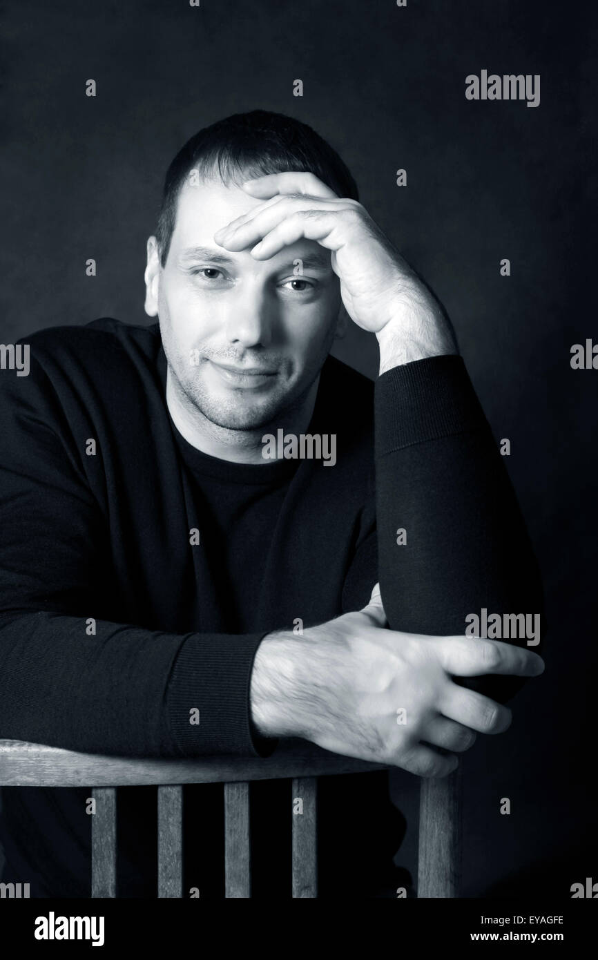 Studio portrait of man isolated on grey background Stock Photo - Alamy