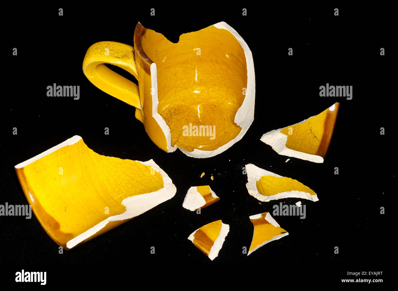 Broken Orange Coffe Cup Stock Photo - Alamy