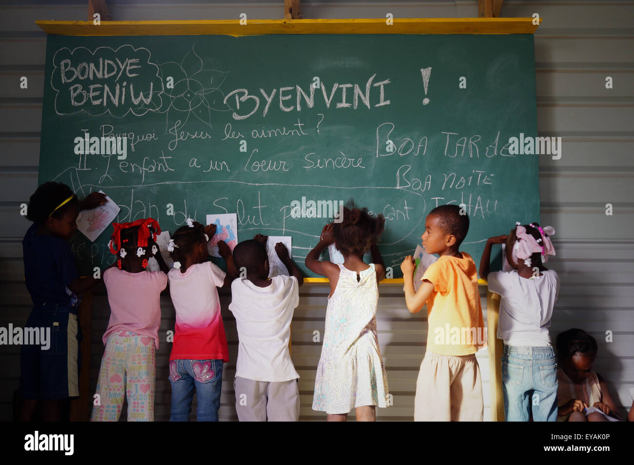 Haitian children writing on blackboard at school Stock Photo - Alamy