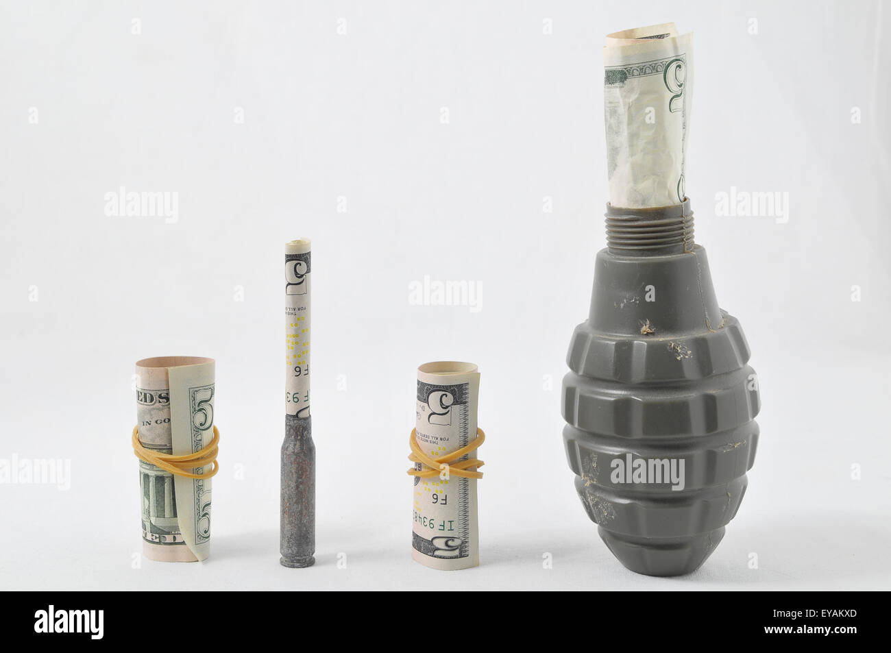 Money and Weapons Concept Weapons and Money Stock Photo - Alamy