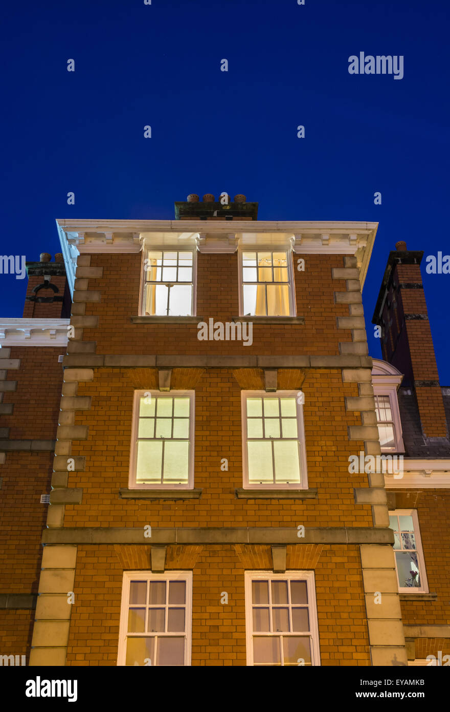 Apartment block night windows hi-res stock photography and images - Alamy
