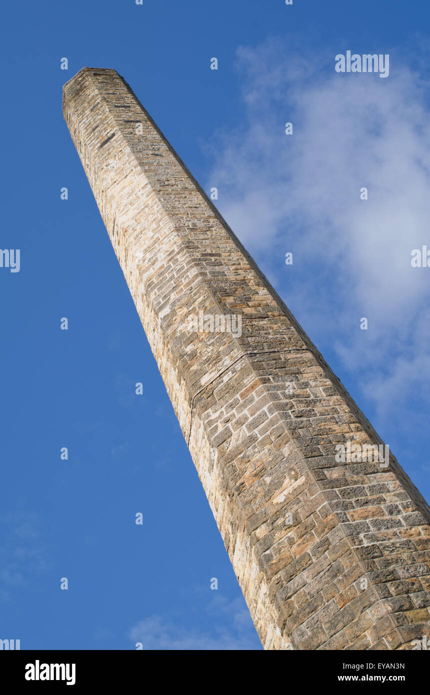 An old mill stack reaches upwards Stock Photo - Alamy