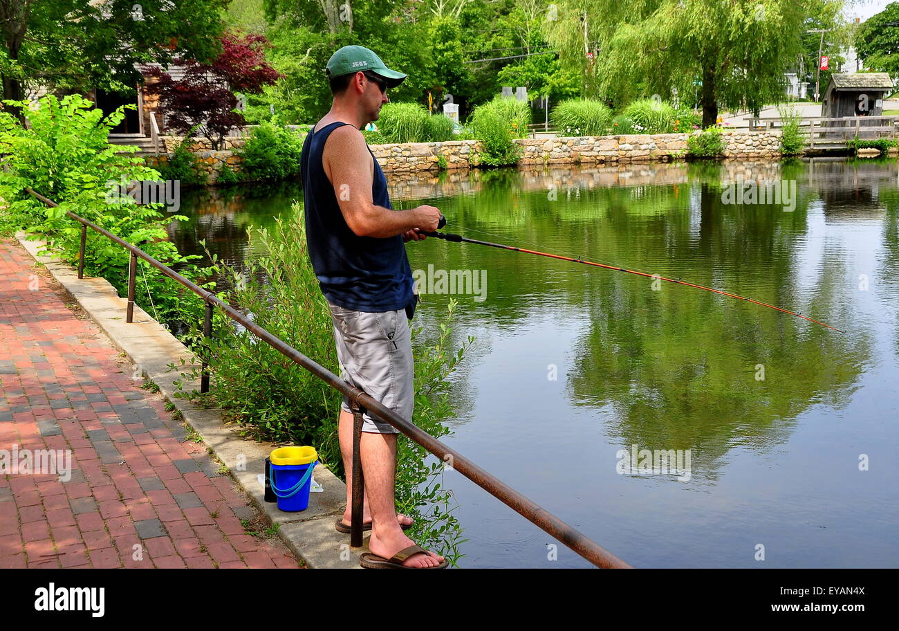Sandwich, Massachusetts: Local resident fishing in the mill pond by the ...
