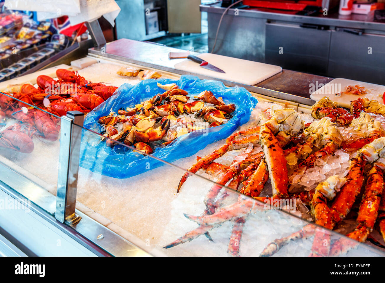 Various seafood on the shelves of the fish market in Norway, Bergen ...