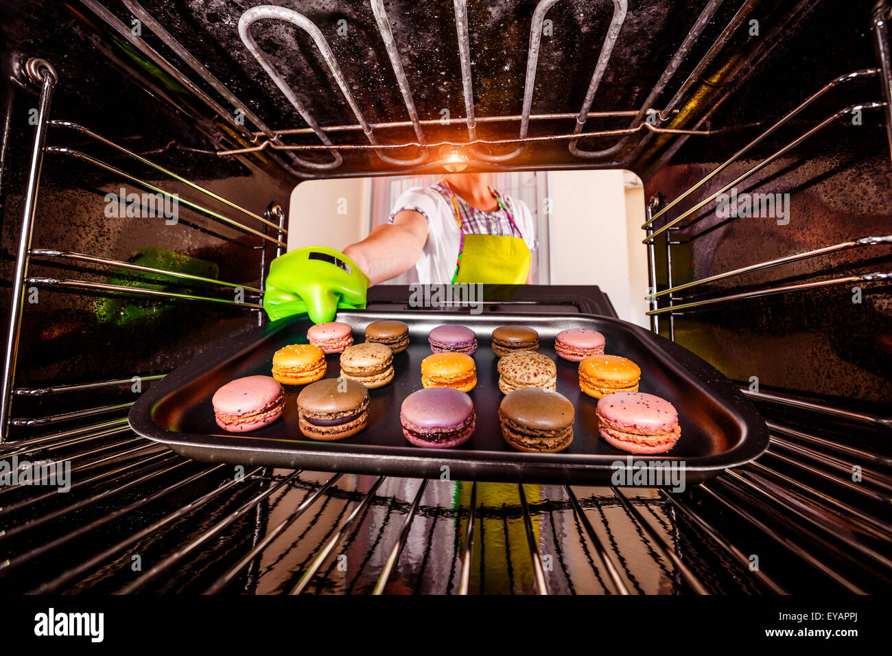 Baking macarons in the oven view from the inside of the oven. Cooking ...