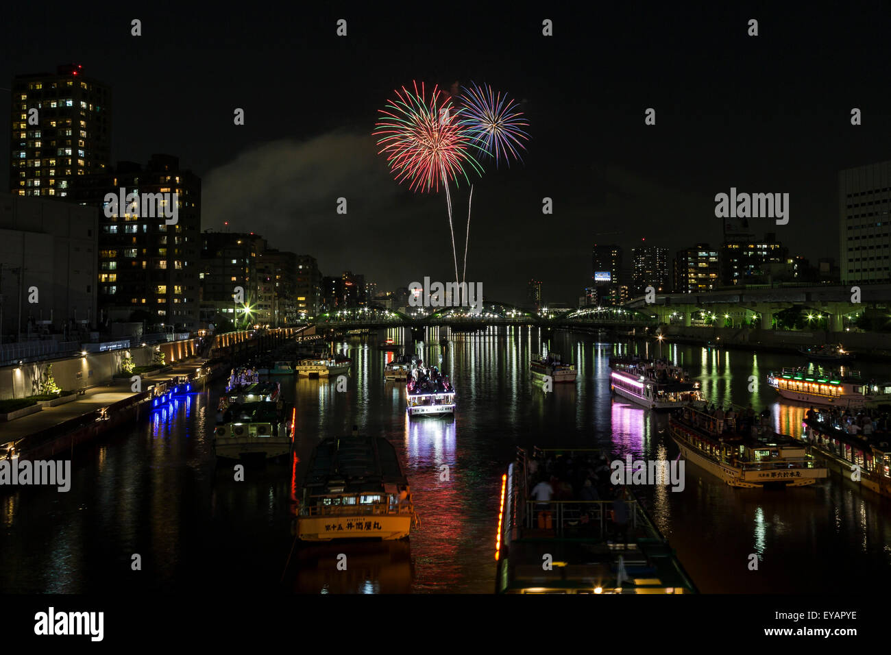 Tokyo, Japan. 25th July, 2015. Fireworks light up the sky over Sumida ...
