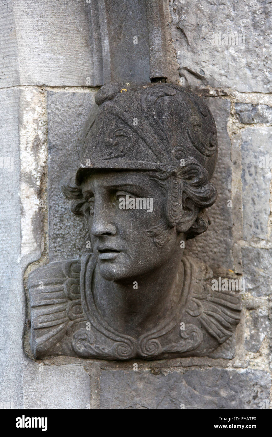 Carved stone head outside the medieval room at Kilkenny Castle Stock ...