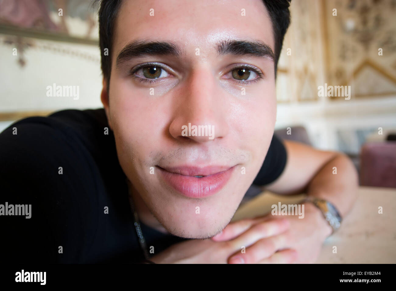 Close-up, headshot with fisheye lens of handsome young man Stock Photo ...