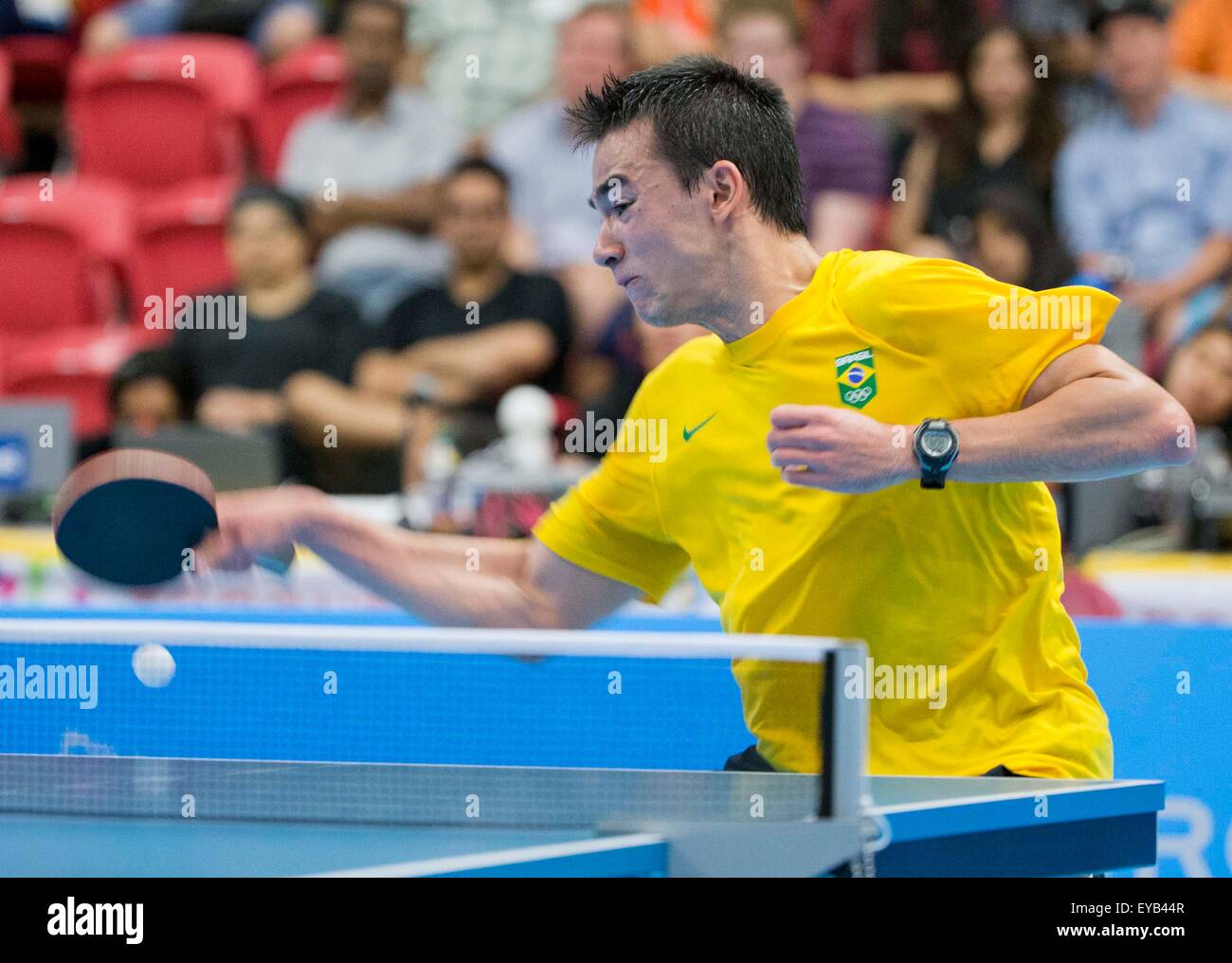 Toronto, Canada. 25th July, 2015. Hugo Calderano of Brazil returns the ...