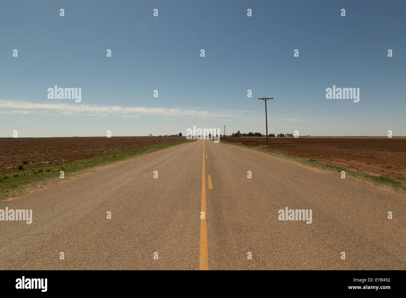 A photograph of a rural stretch of Route 380 in the Texas South Plains ...