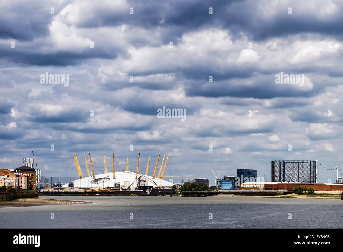 Greenwich, London - O2 Arena, River Thames, gasometer and cloudy sky ...