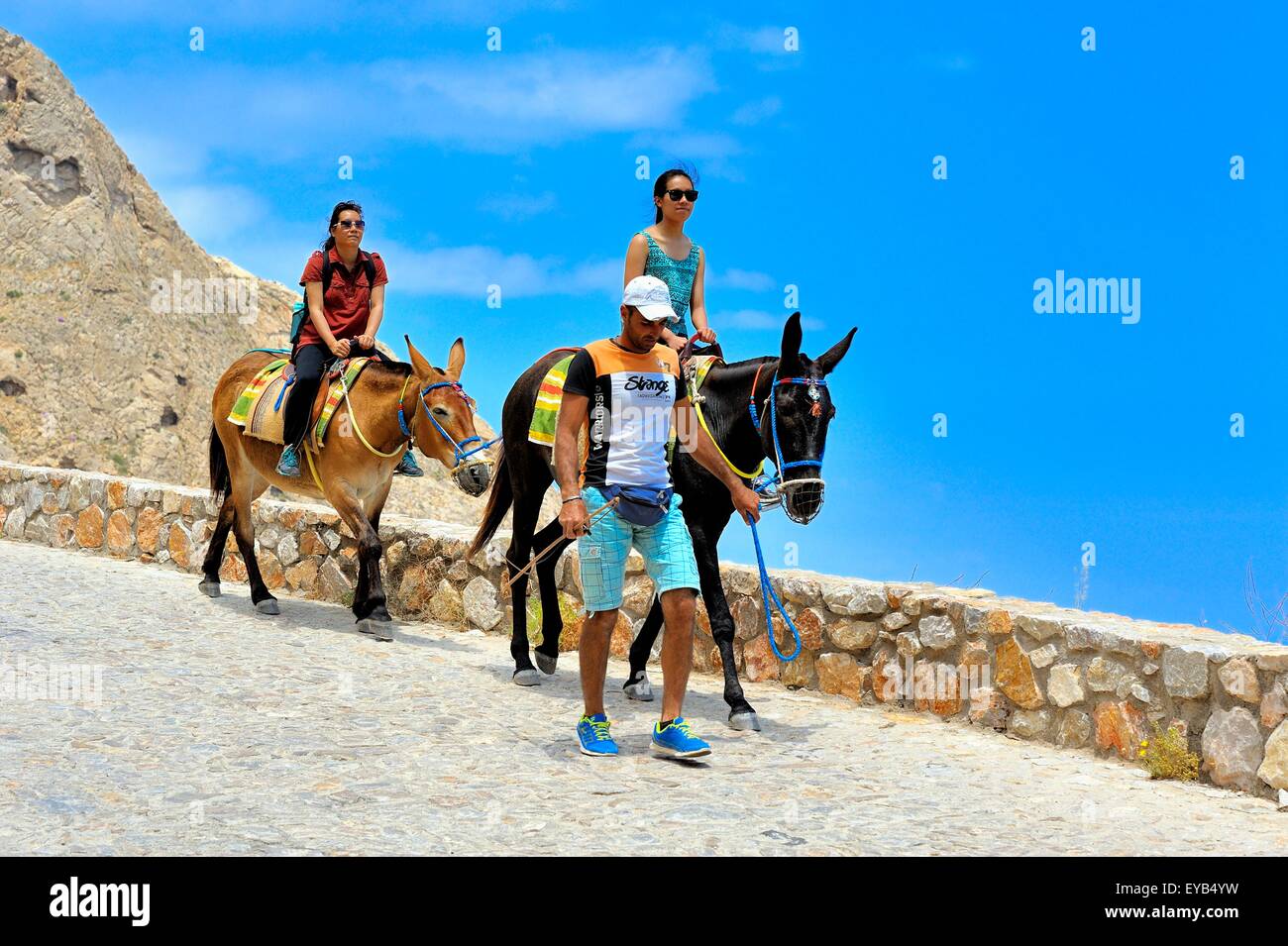 Woman riding donkey hi-res stock photography and images - Alamy