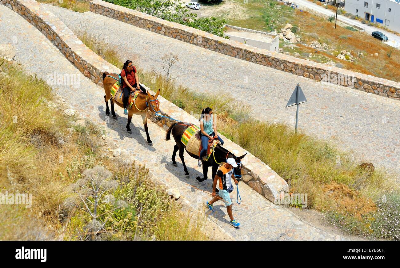 Woman riding donkey hi-res stock photography and images - Alamy