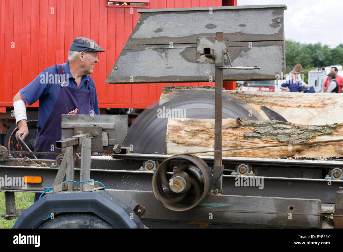 Man operating a wood Saw mill Blade Powered by a traction Engine Stock ...