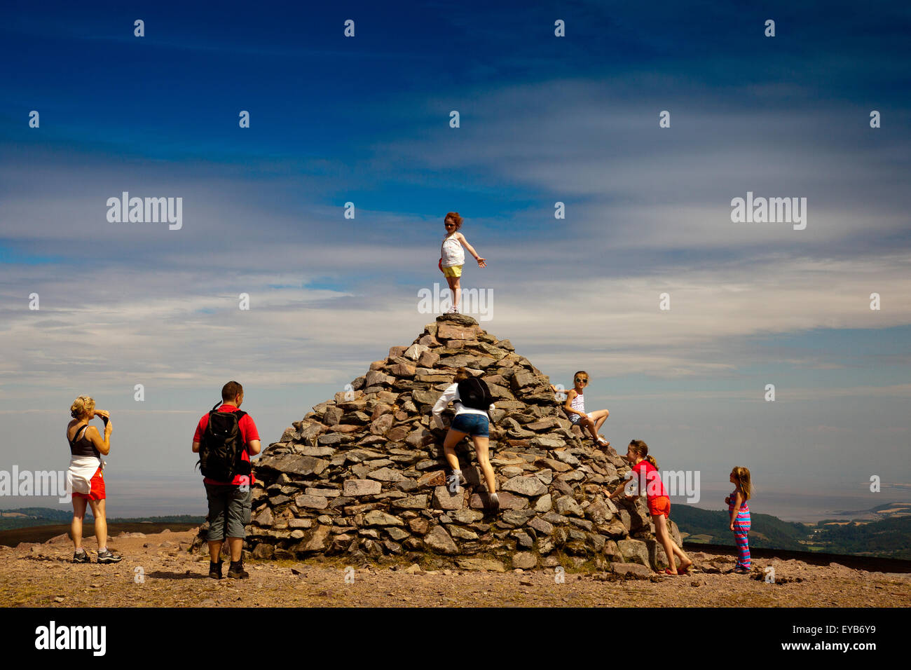 A collection of visitors at the summit of Dunkery Beacon (1,705ft ...