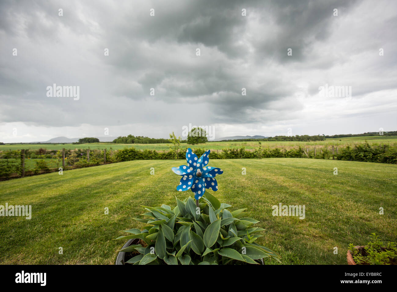 Natural view looking out over fields from a back garden in a house in ...