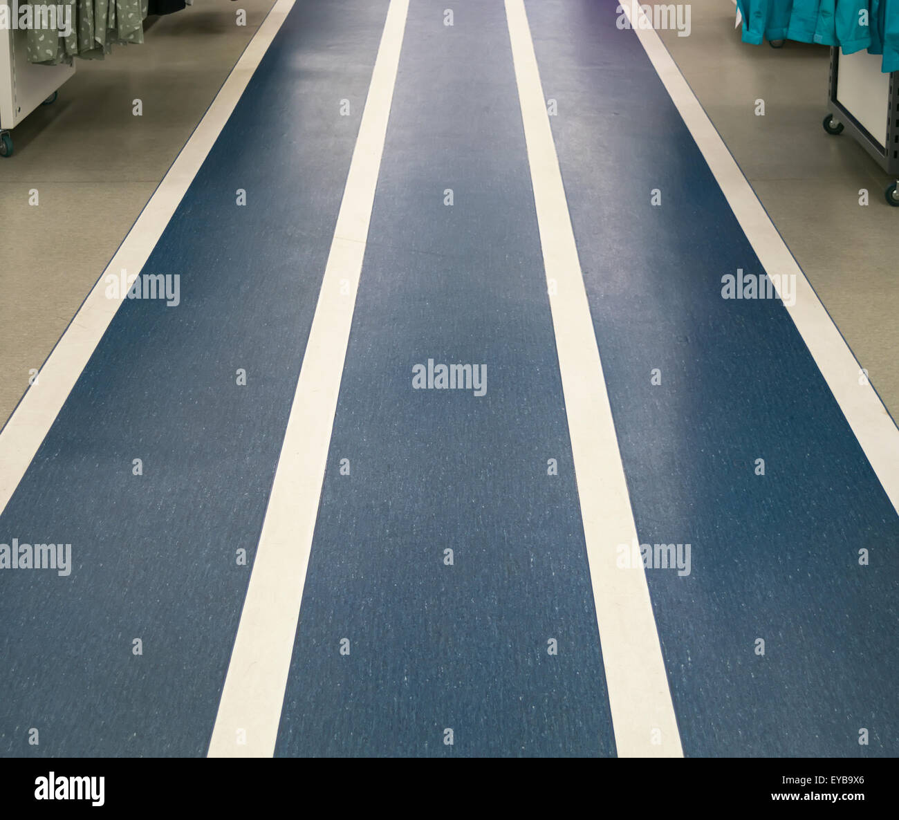 Three-lane track denim color on the floor in a spacious room Stock ...