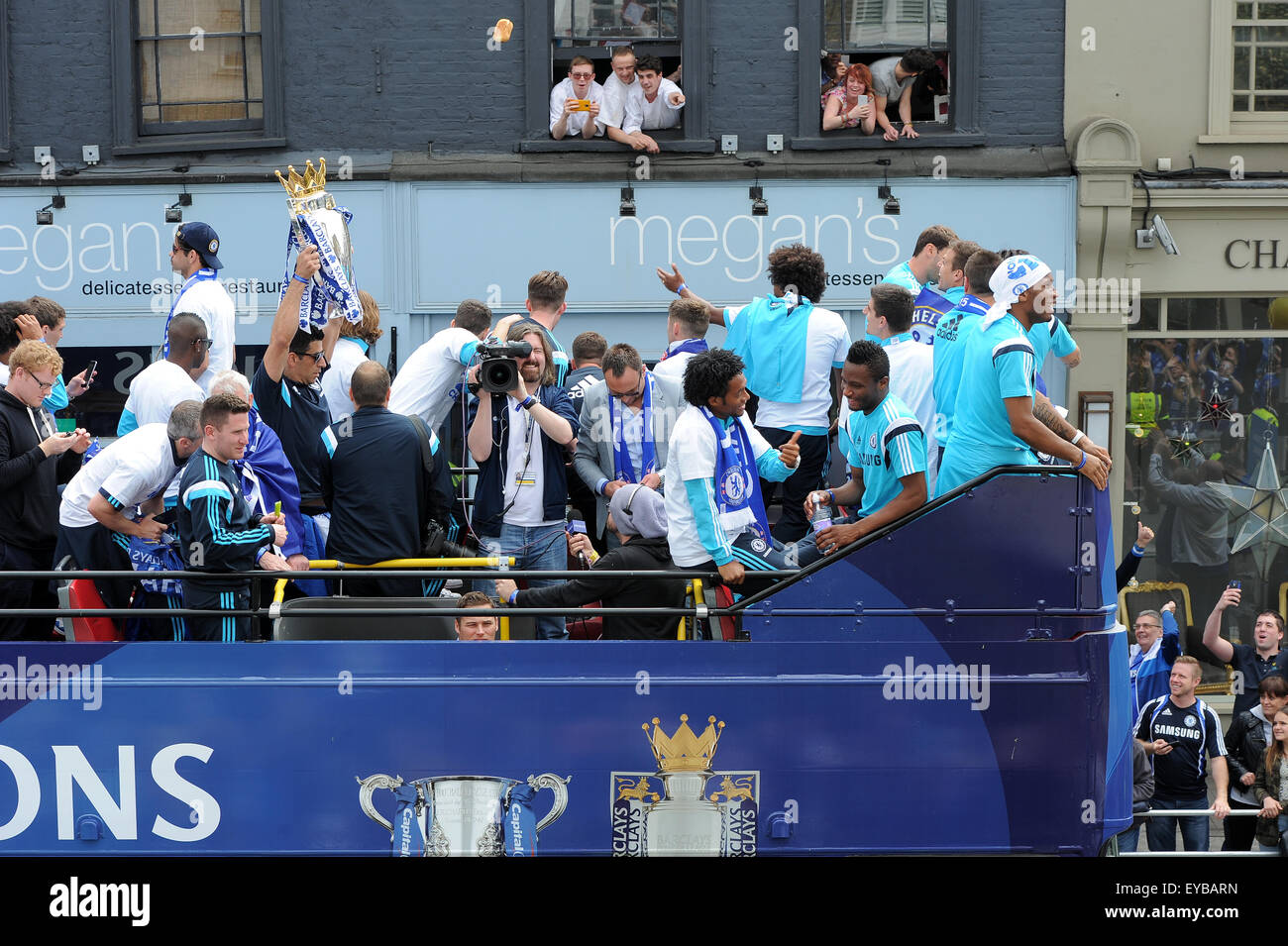 Chelsea Football Club players and staff take a victory parade on an ...