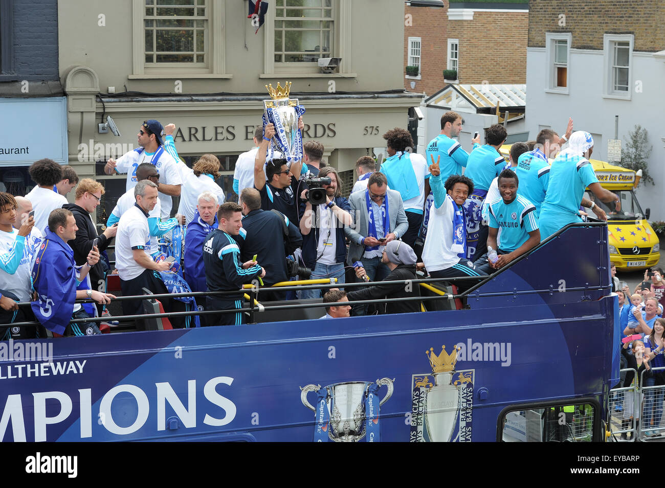 Chelsea Football Club players and staff take a victory parade on an ...