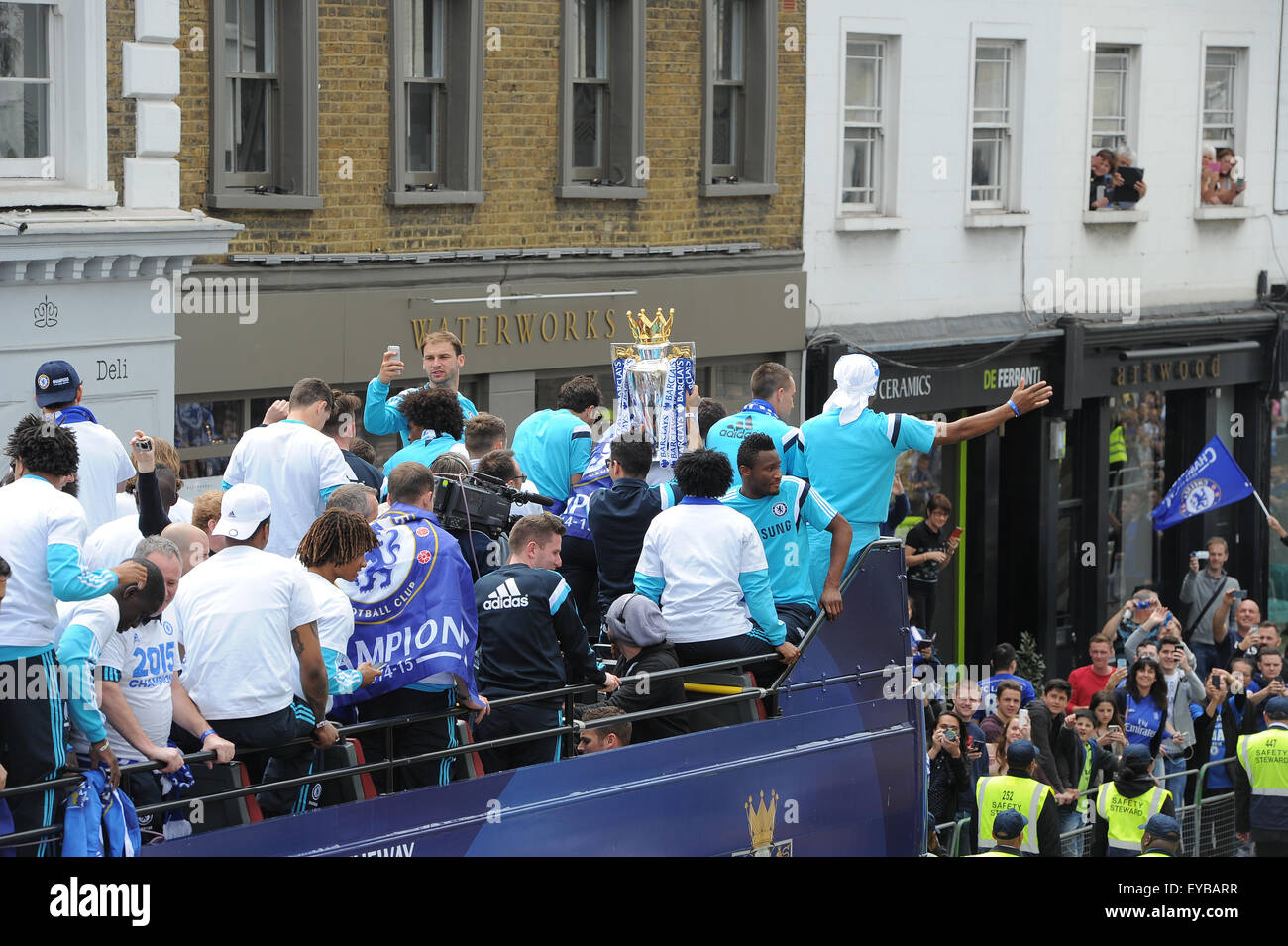 Chelsea Football Club players and staff take a victory parade on an ...