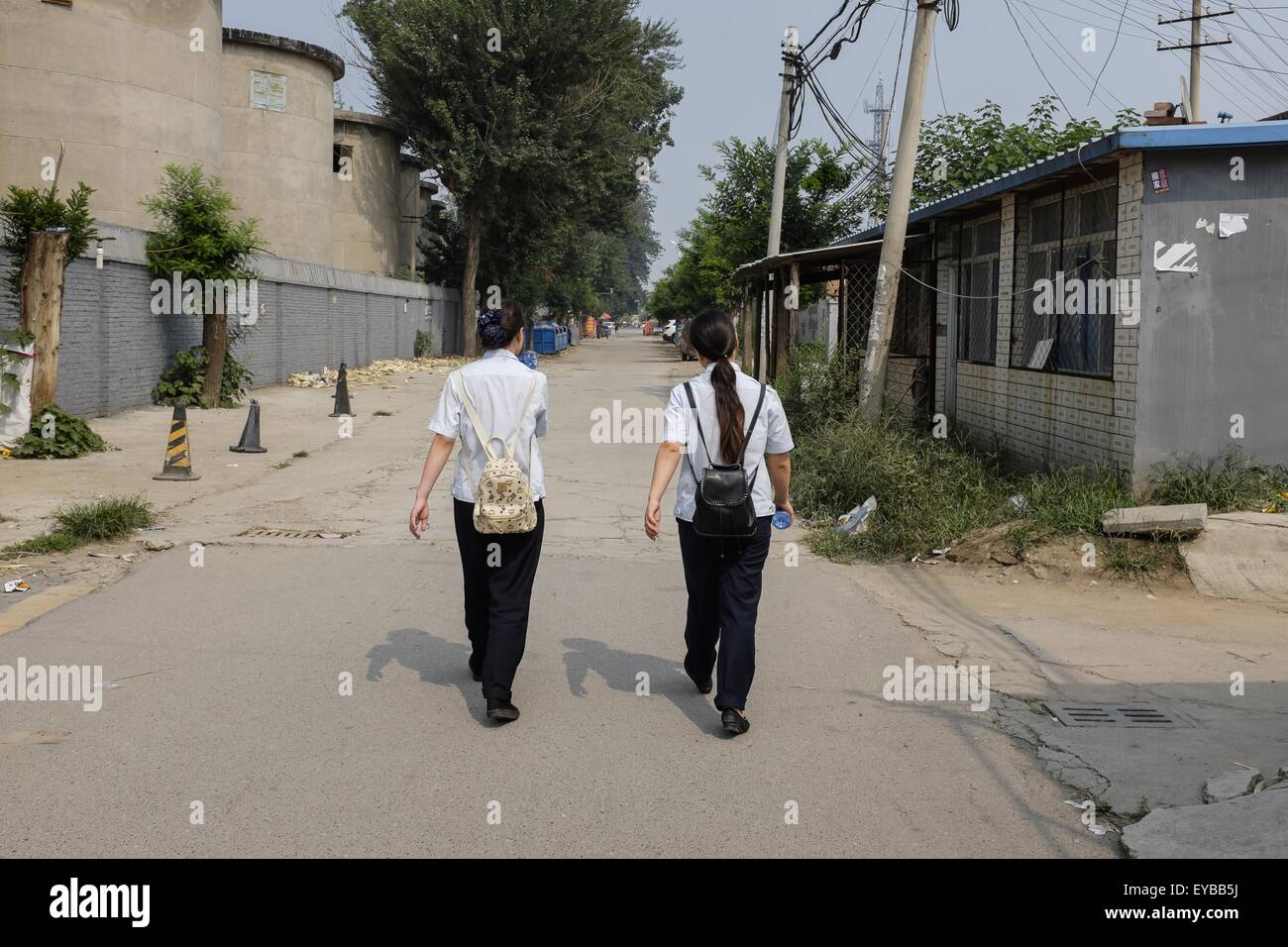 Beijing, China. 26th July, 2015. Walk at the street of Lucheng Town ...