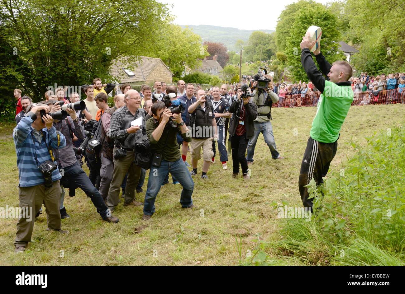 The annual cheese rolling race at coopers hill in gloucestershire hi ...