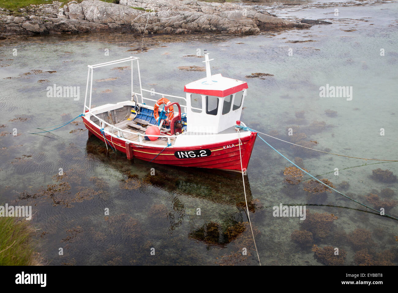 Small fishing boat on the east coast of Barra, Outer Hebrides, Scotland ...
