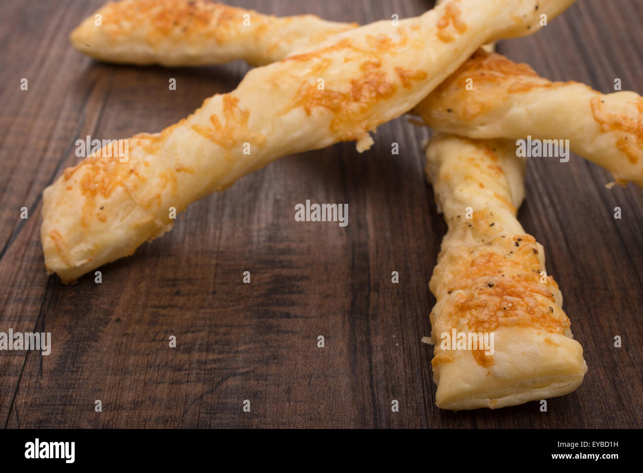 Fingerfood cheese sticks with flaky pastry, parmesan cheese and pepper ...