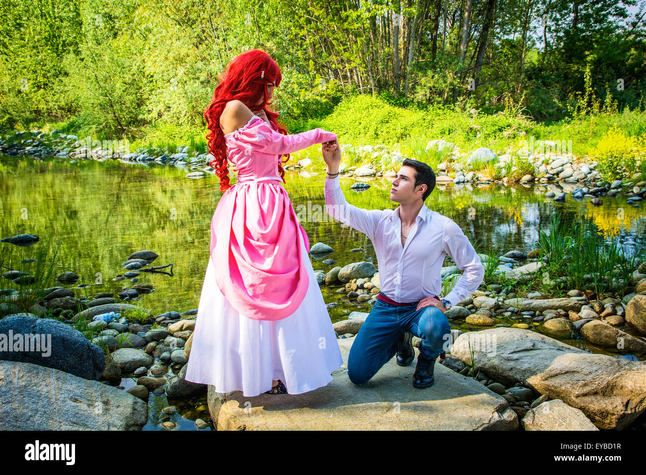 Romantic Fairy Tale Couple Sitting on Rocks at River Side in Peaceful ...