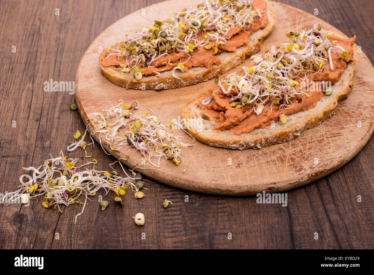 Bread with vegan spread of beans and sprouts Stock Photo - Alamy