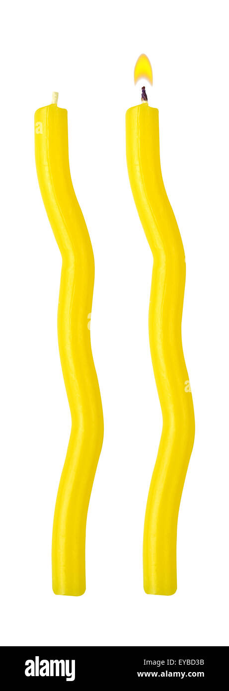 yellow curved lighted candle set isolated on white background Stock ...