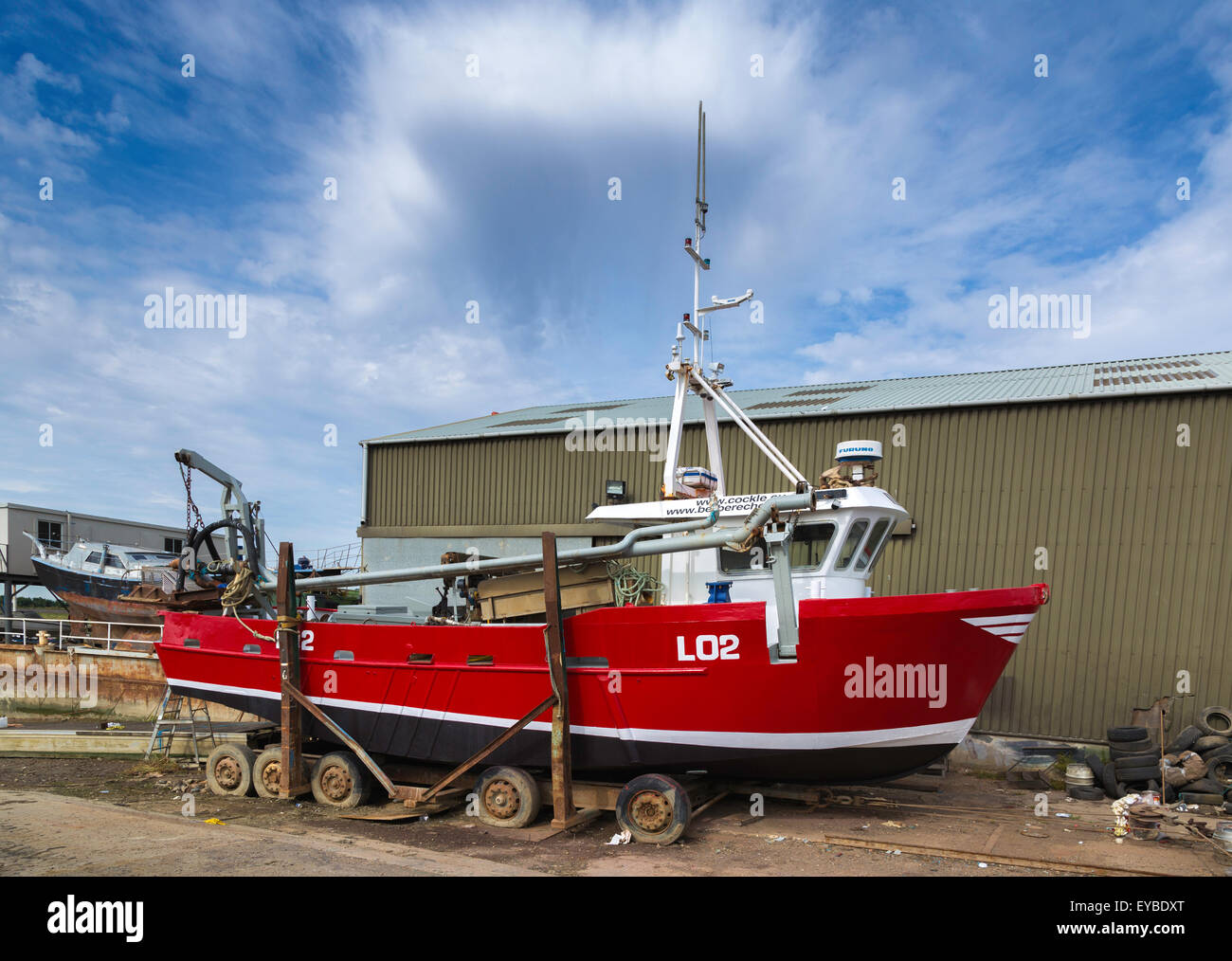 Fishing Boat out of Water Stock Photo - Alamy