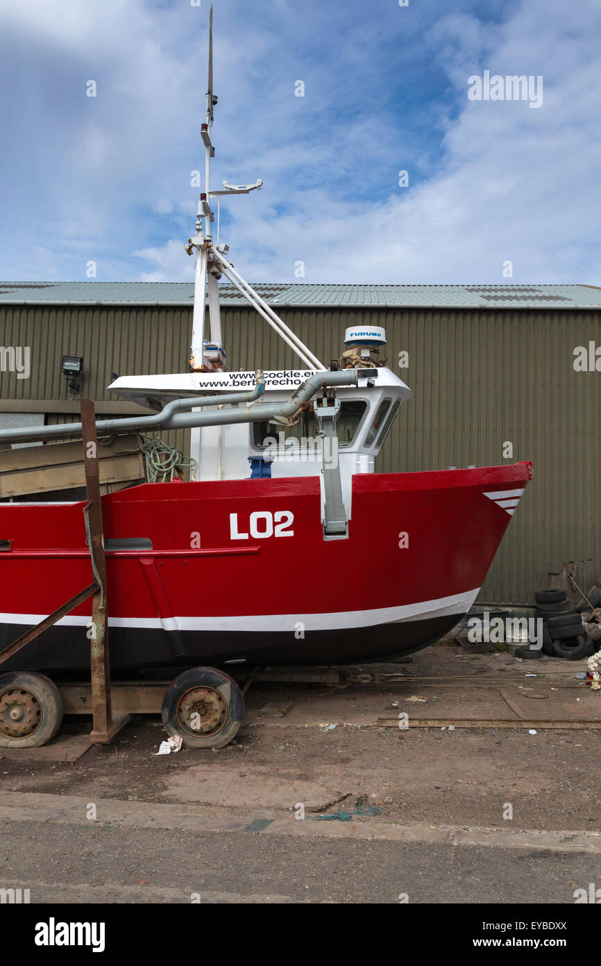 Fishing Boat out of Water Stock Photo - Alamy