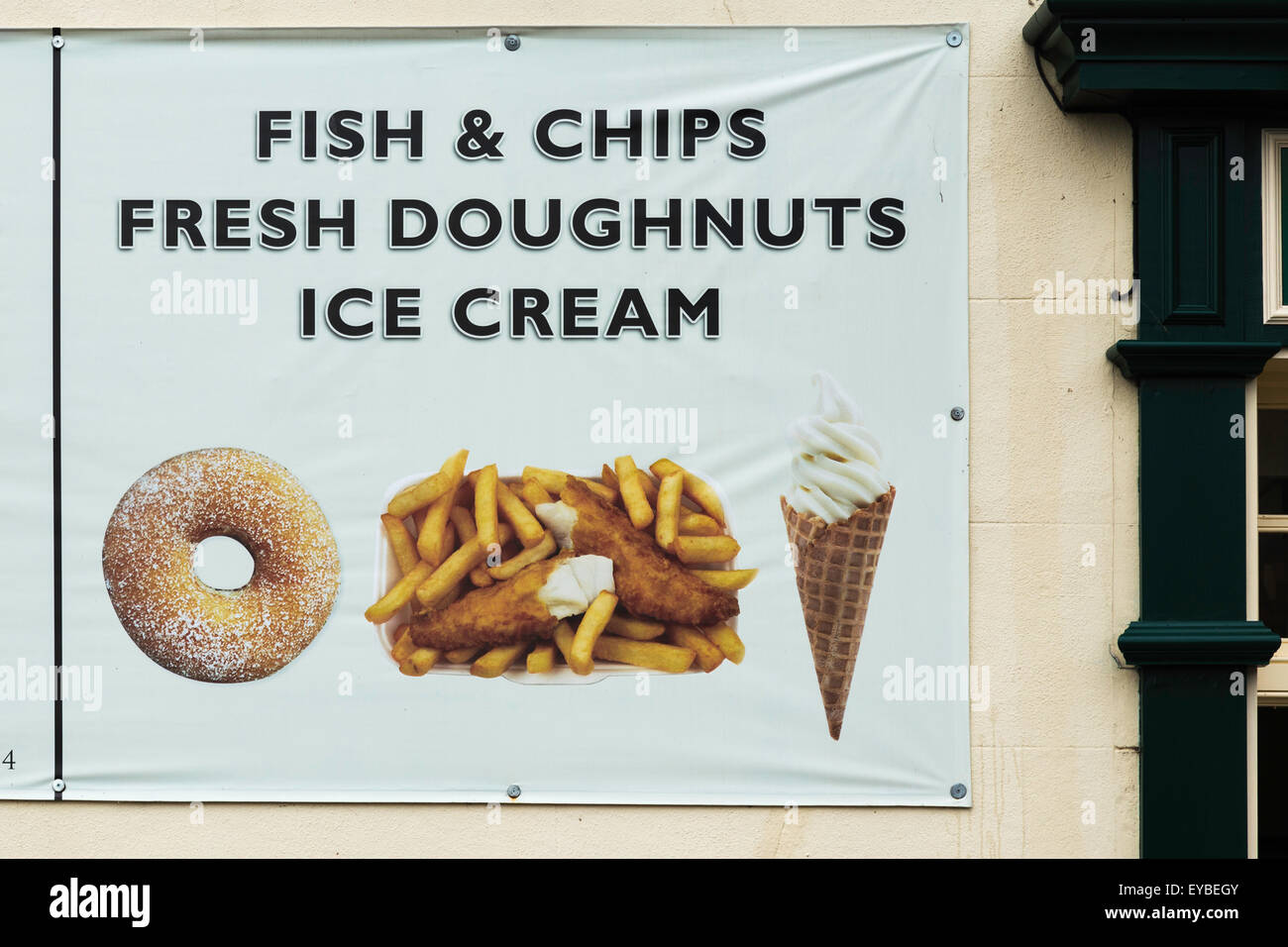 Large Sign Advertising Fish and Chips,Doughnuts and Ice Cream Stock ...