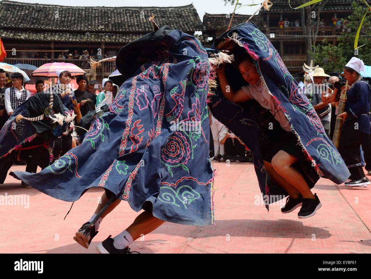 Qiannan, China's Guizhou province. 26th July, 2015. People of Shui ...