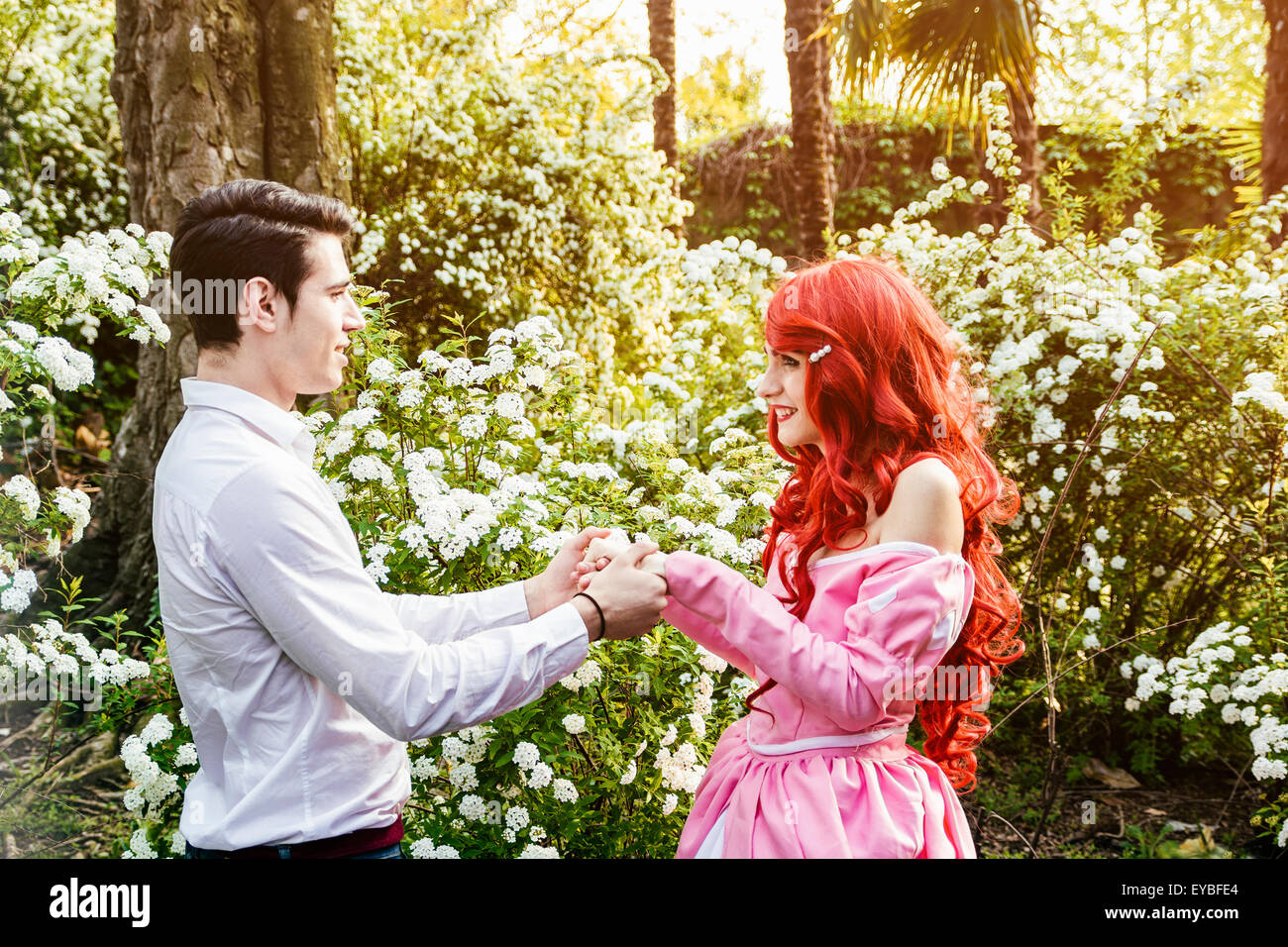 Romantic Fairy Tale Couple Sitting on Rocks at River Side in Peaceful ...