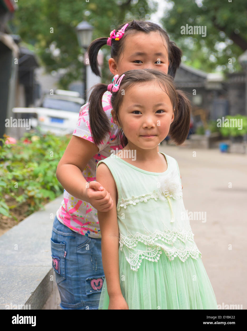 Chinese girls (sisters ?) in Hou Hai hutong, Beijing, China Stock Photo ...