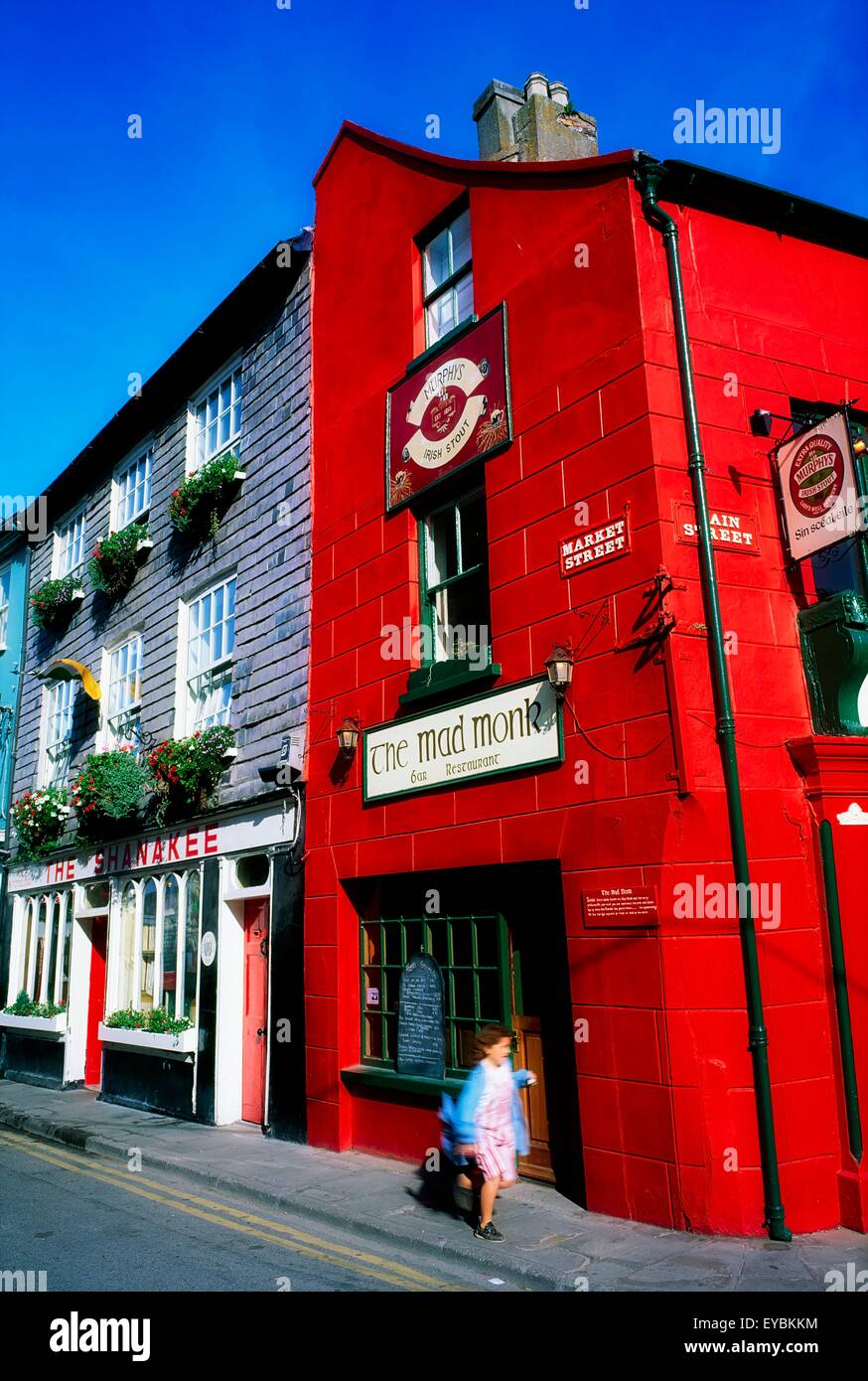 The Mad Monk, Kinsale, Co Cork, Ireland; Person Running By A Pub And ...