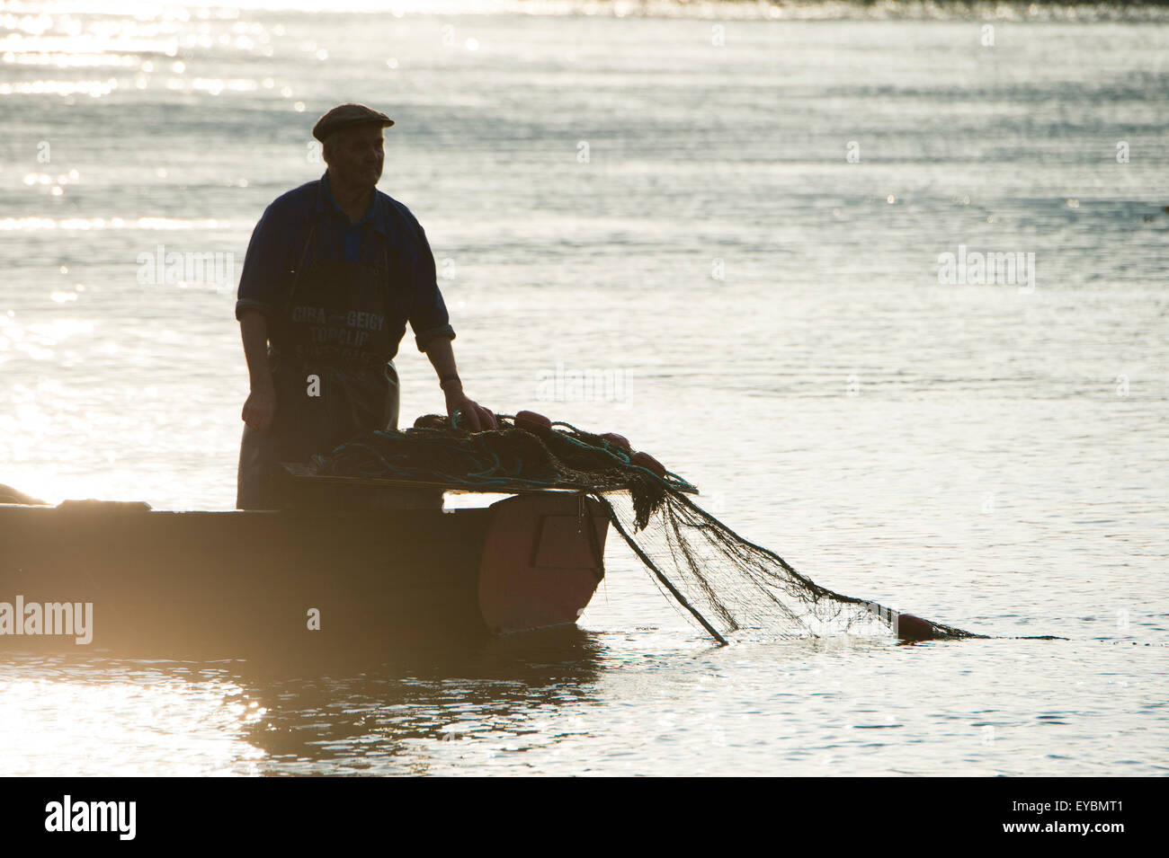 Seine netters on the Dyfi: Licensed fishermen in a small rowing boat ...