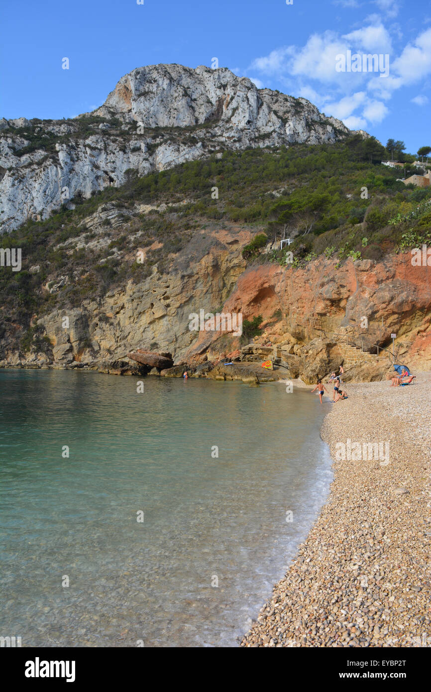 cliffThe pebble beach at Cala Granadella on the Costa Blanca, early on ...