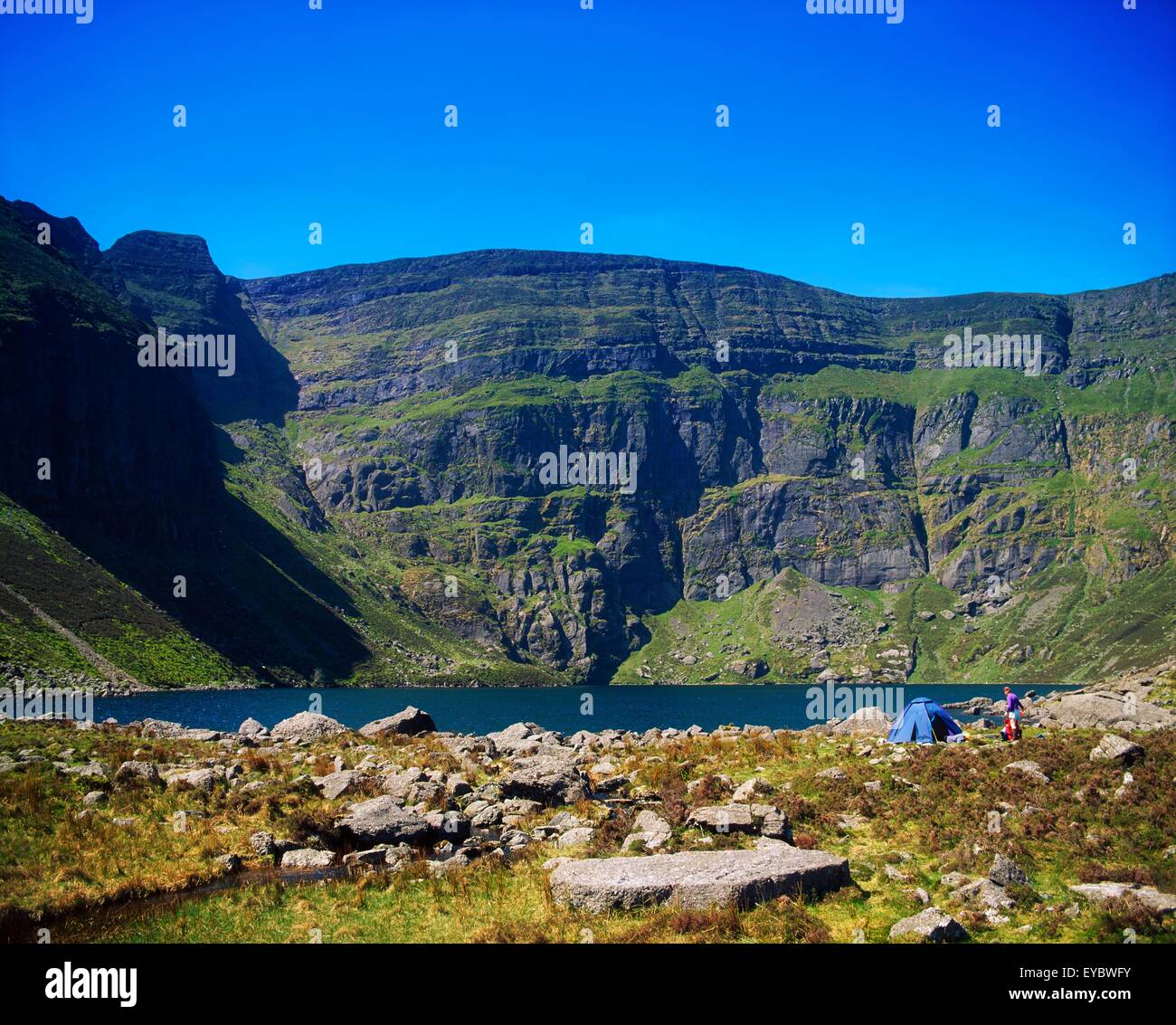 People camping by the comeragh mountains and lake coumshingaun hi-res ...