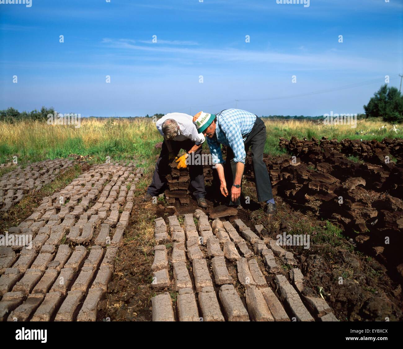 Stacking Turf, Rathangan, Co Kildare, Ireland Stock Photo - Alamy