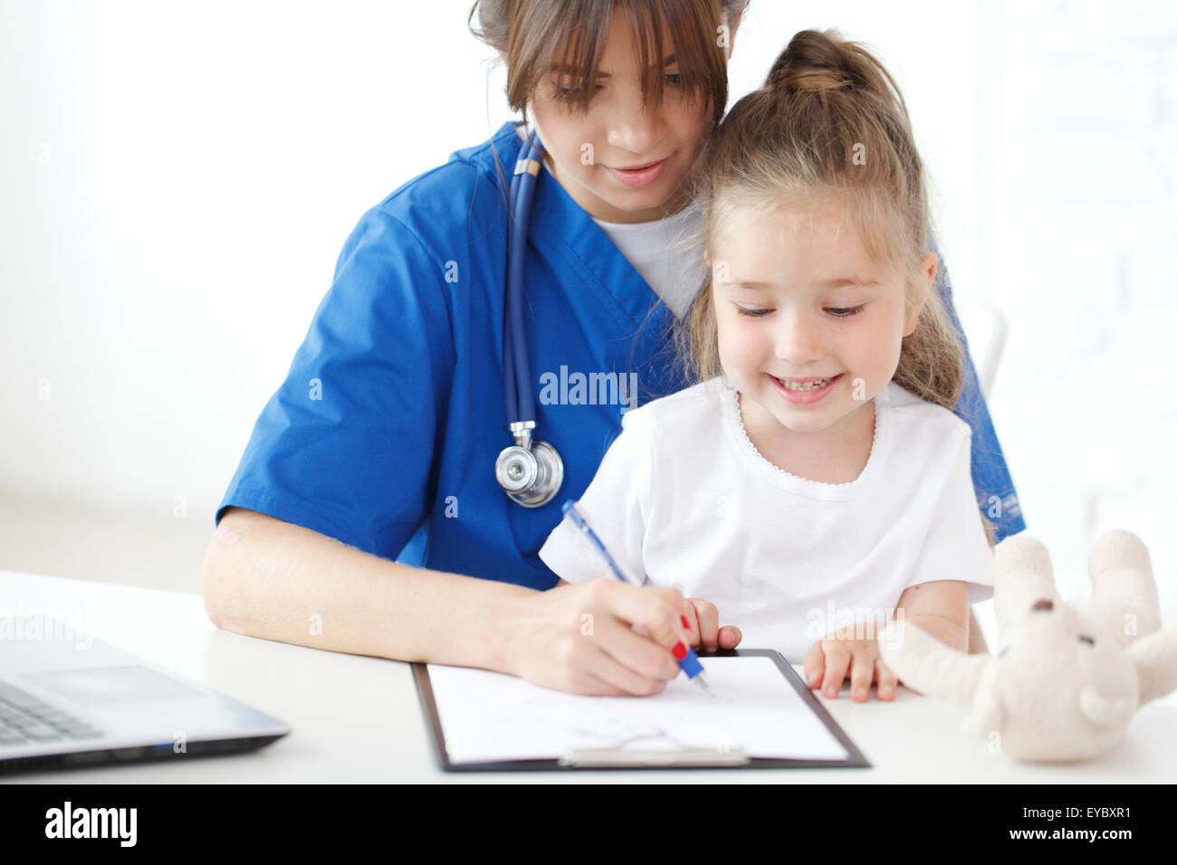 nurse and kid Stock Photo - Alamy