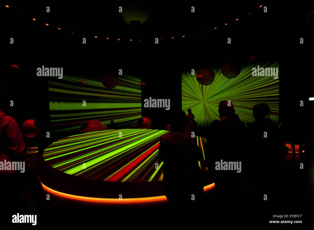 People at the CERN Visitor Centre in Geneva, Switzerland. CERN is the ...