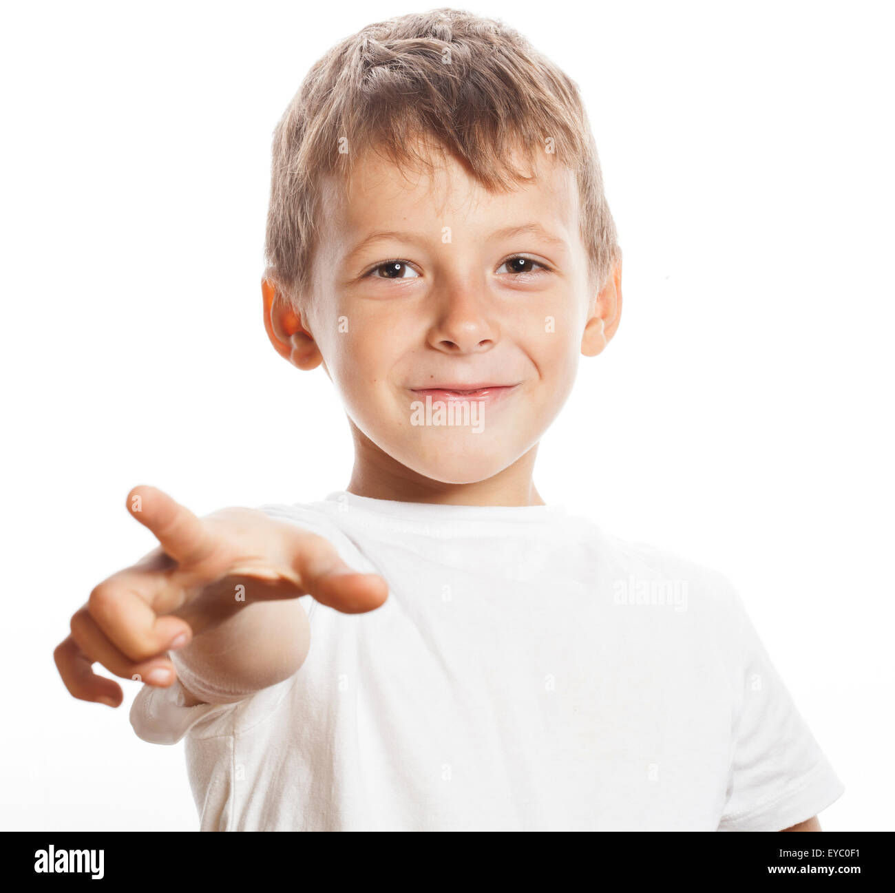 little cute boy pointing in studio isolated close up Stock Photo - Alamy