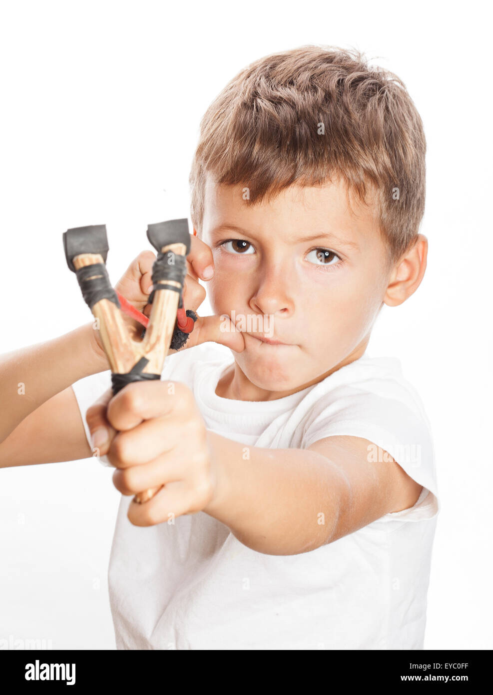 little cute angry boy with slingshot isolated Stock Photo - Alamy