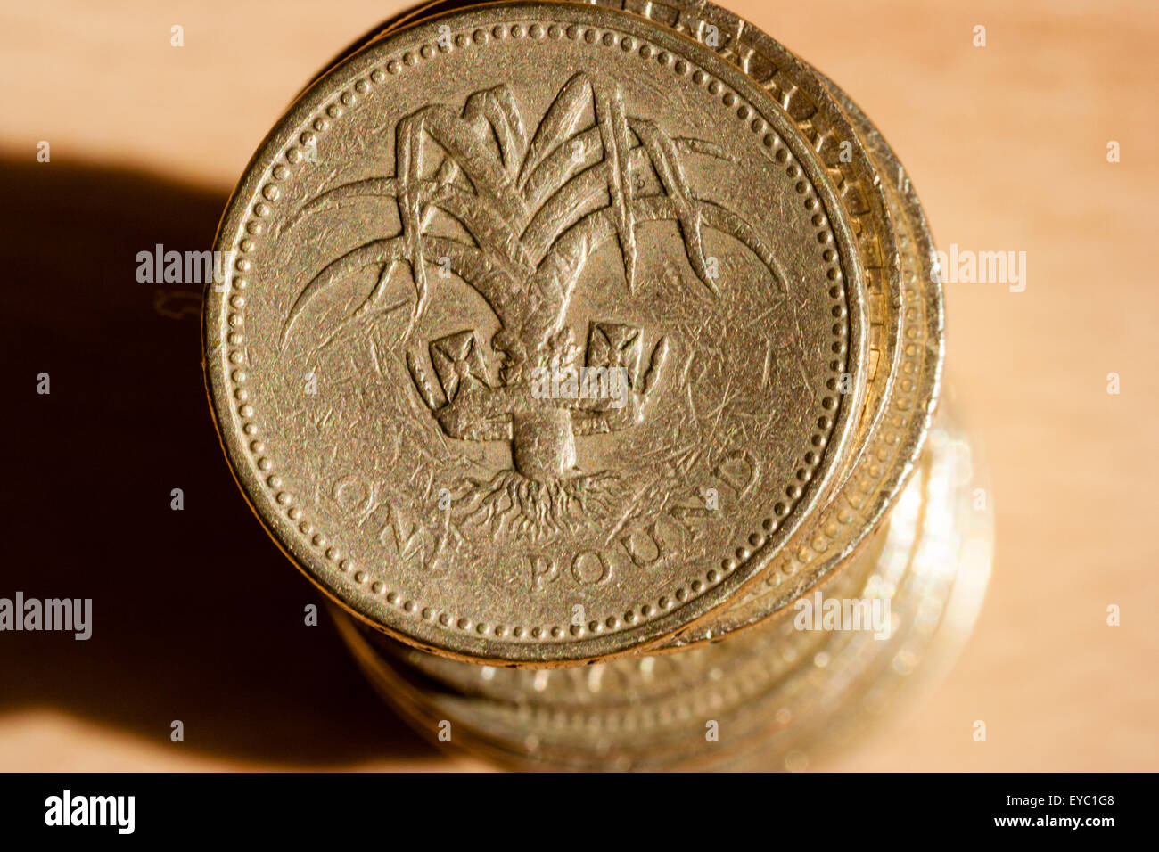 Stack of British old style one pound, £1 coins, seen from above Stock ...